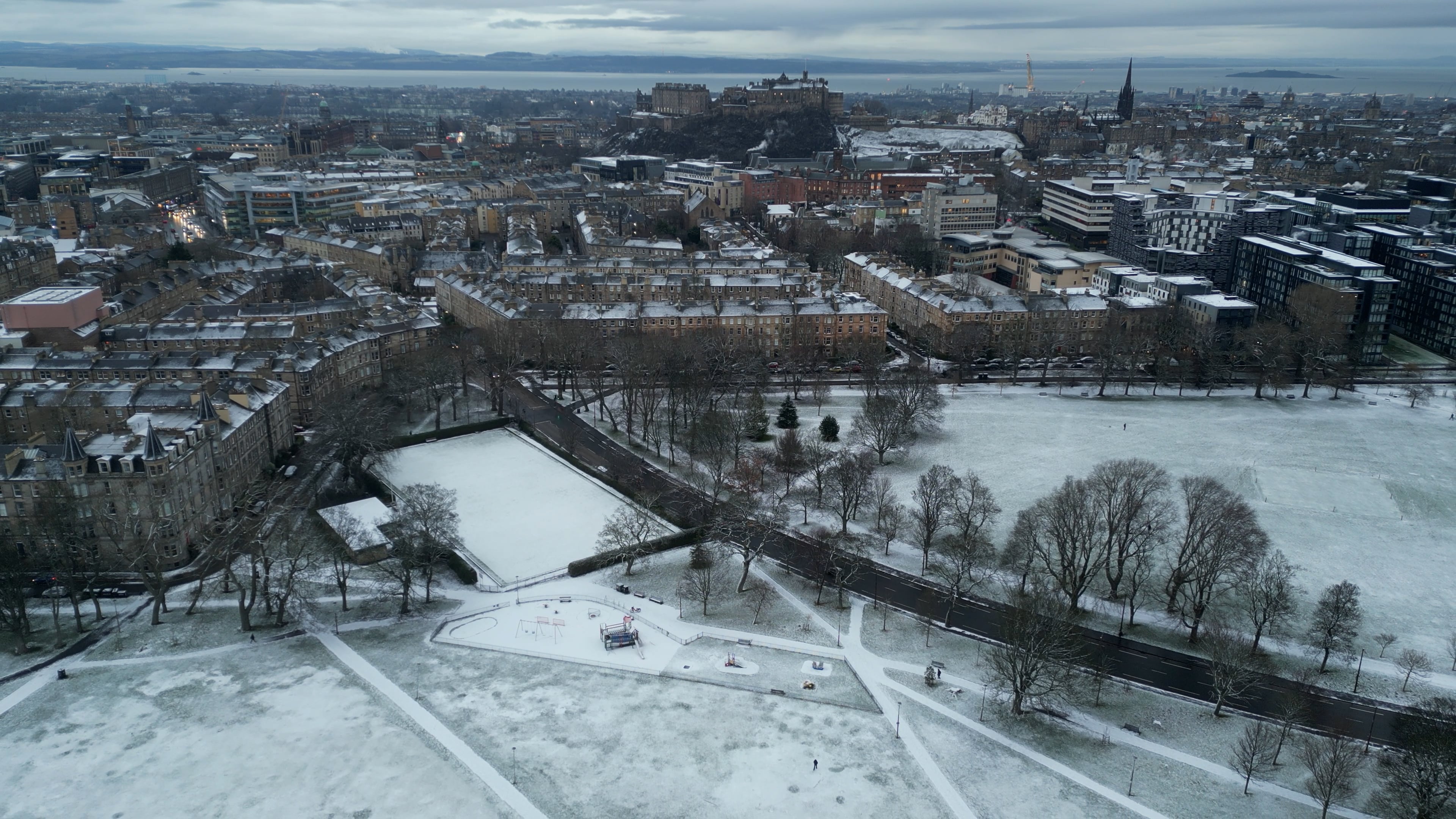Drone footage shows Edinburgh blanketed in snow after wintry overnight ...