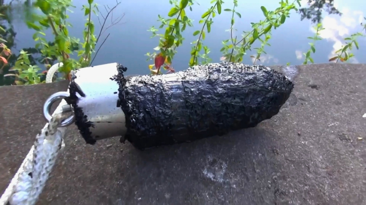 Magnet fishing a WWII battlefield - live explosives found underwater