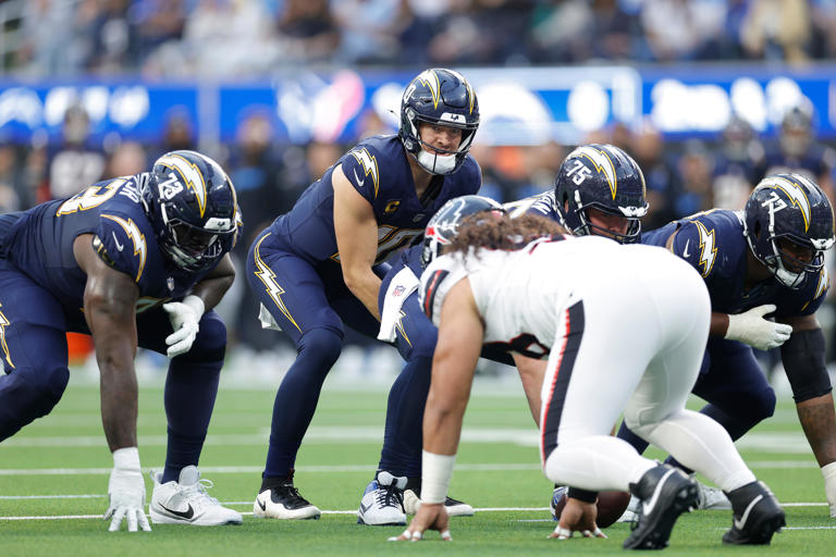 Who has the advantage in the Chargers vs. Patriots wild-card matchup?