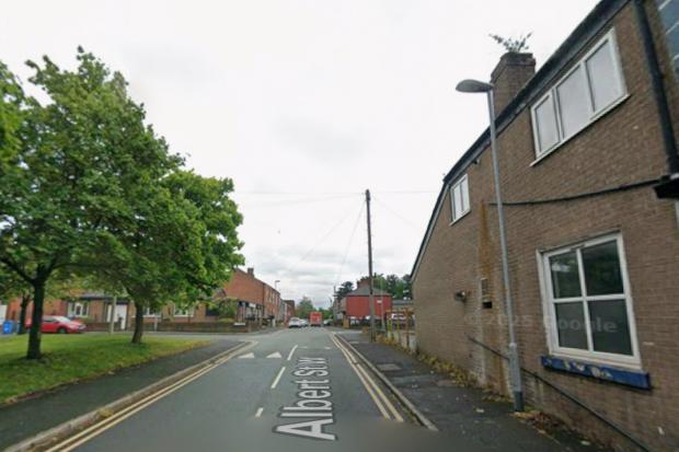 Woman in 90s in serious condition after being hit by reversing vehicle