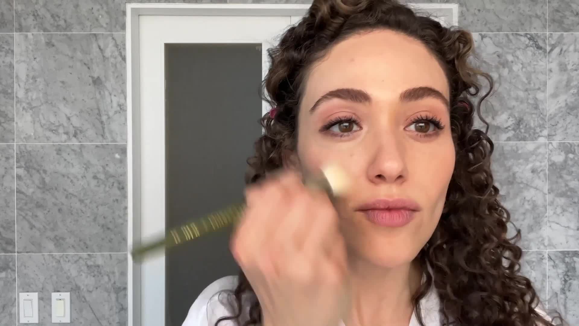 Emmy Rossum shares her 28-step beauty routine, from curly hair care to ...