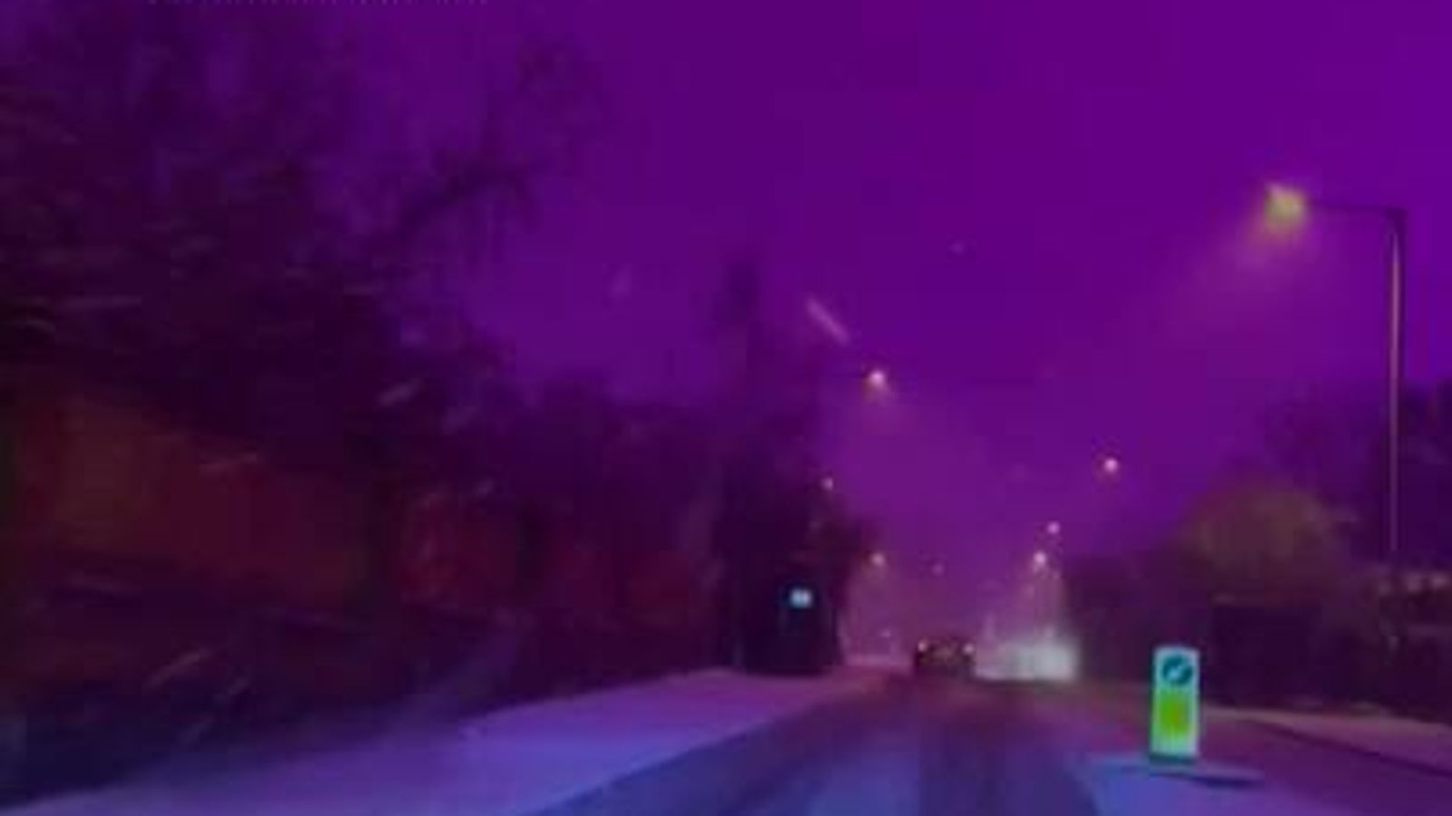 What caused Birmingham's glowing pink skies?