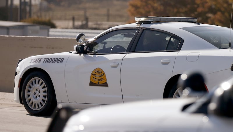 Woman falls off bridge, dies after stopping to assist with crash on I-84