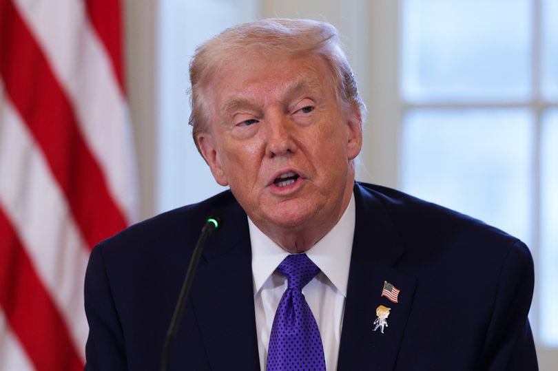 Trump's inflated ego on show as he wears pin badge of himself at ...