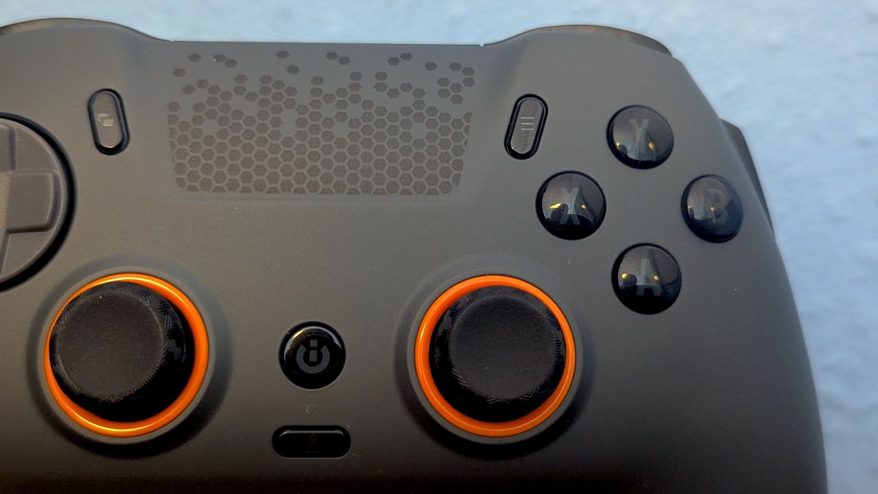 I love the Scuf Envision Pro V2’s form factor and extra clicky buttons ...