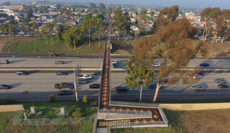 New mural between Barrio Logan, Logan Heights reclaims bridge as canvas ...