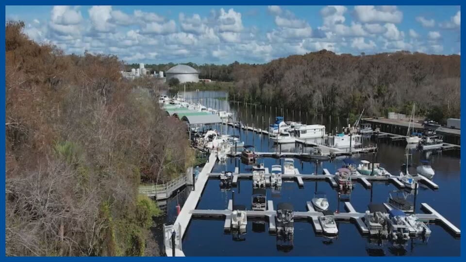 Boater survives top of boat being blown off near Sanford