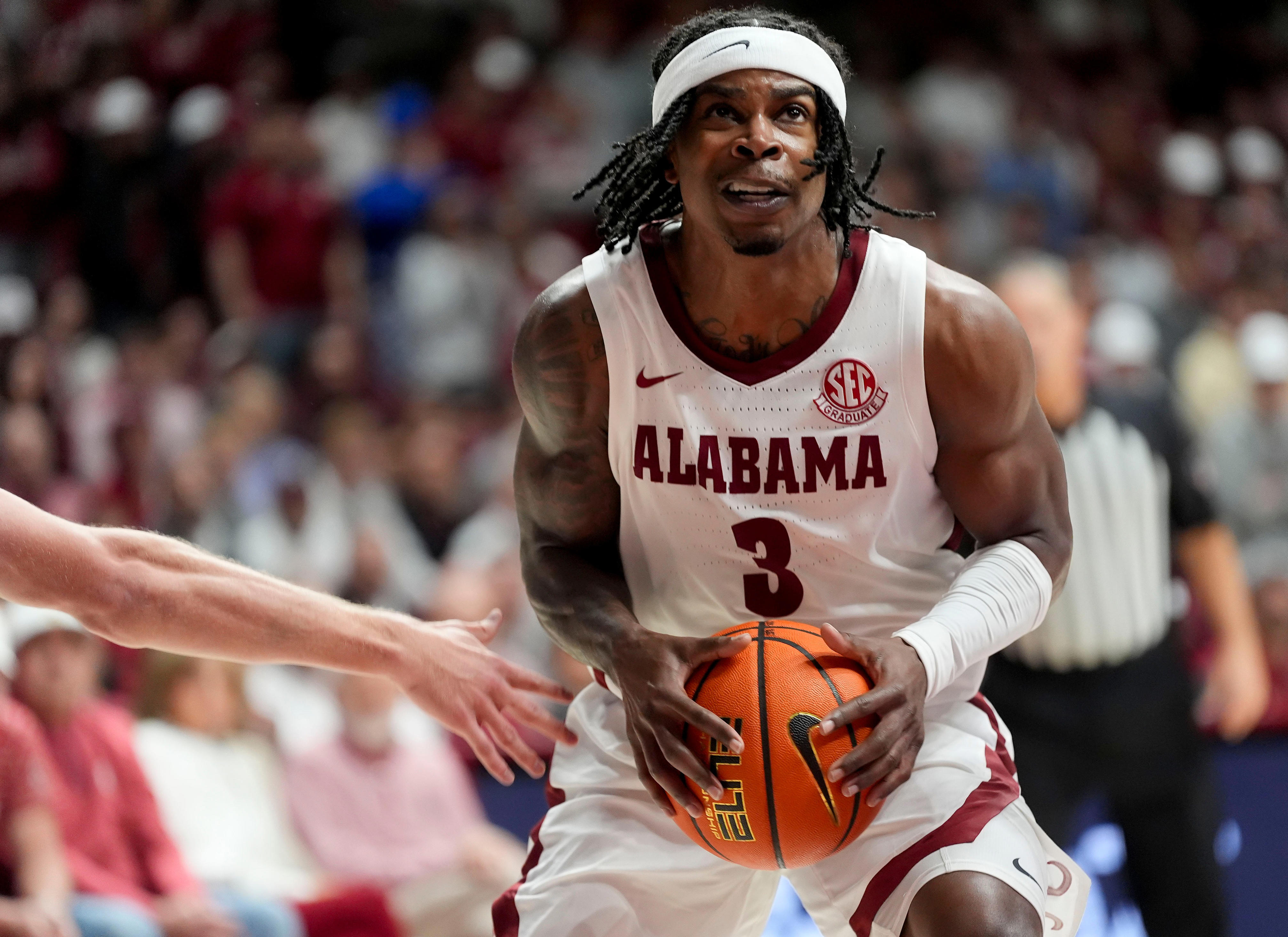 What book did Alabama basketball's Nate Oats give Latrell Wrightsell?