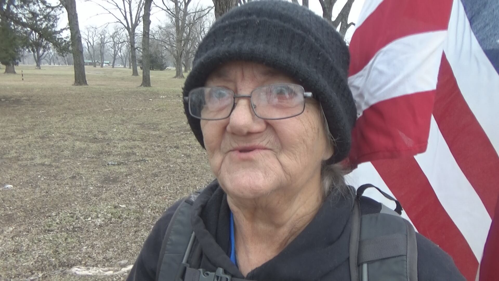 Junction City woman carries flag and backpack with names to honor the ...