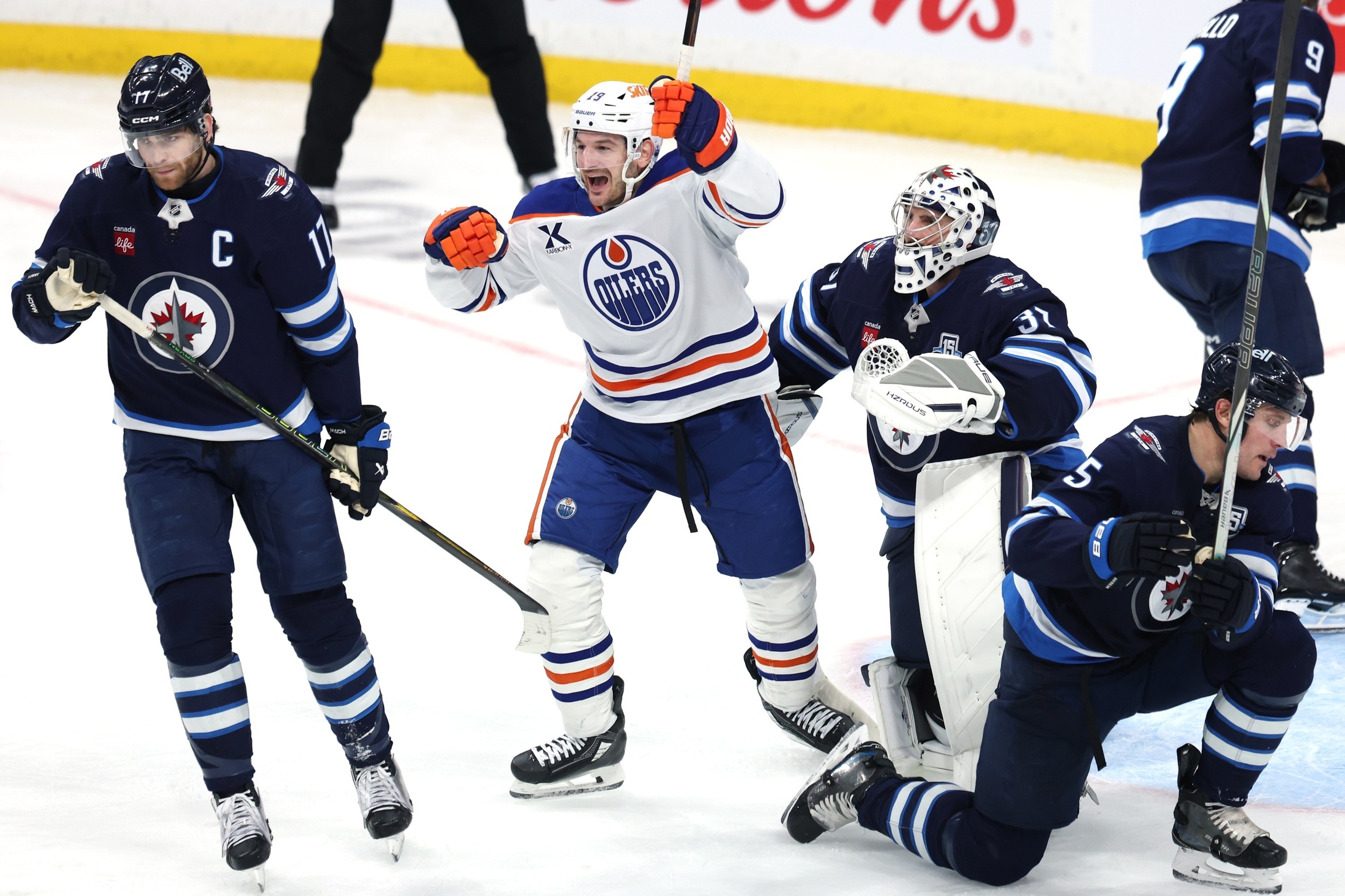 Oilers dominate second and third periods to hand Winnipeg 11th straight ...