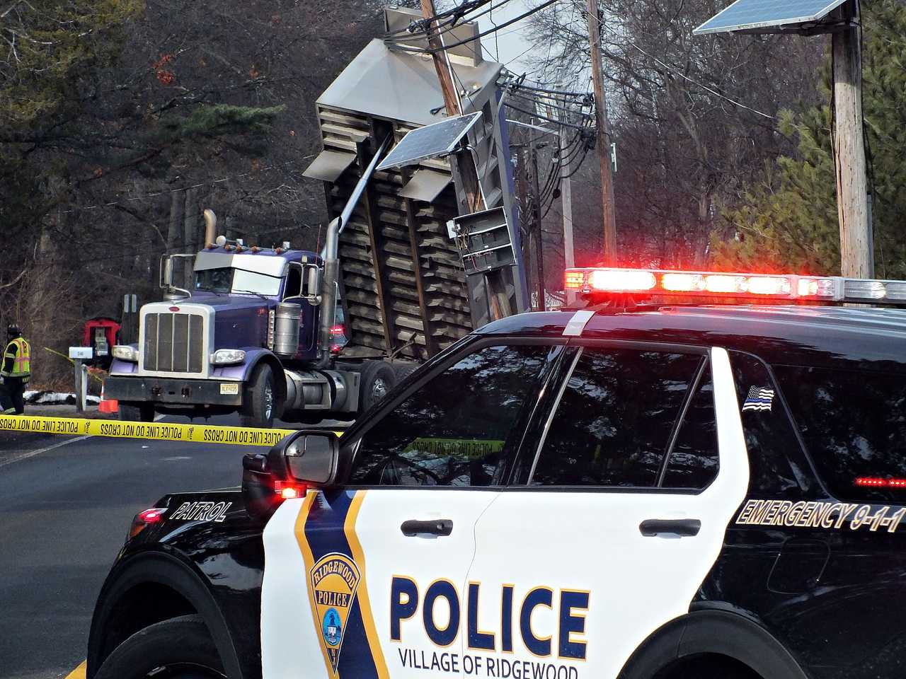 Rock salt run goes sour when dump truck snags wires, pole in Ridgewood