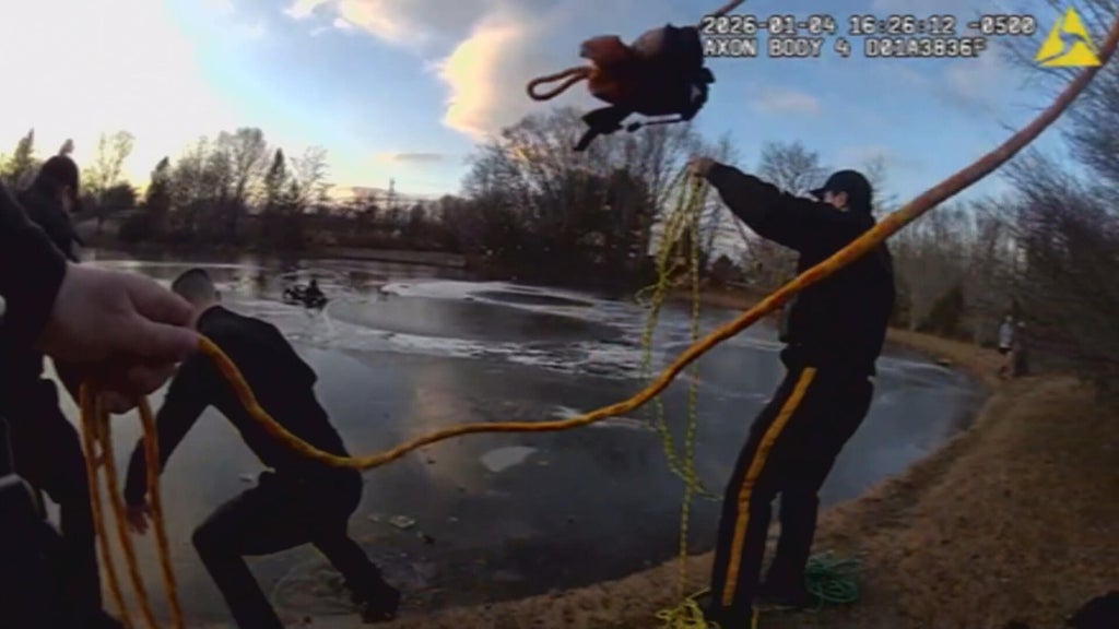 Body camera video shows New Jersey police officers rescue boy from icy ...