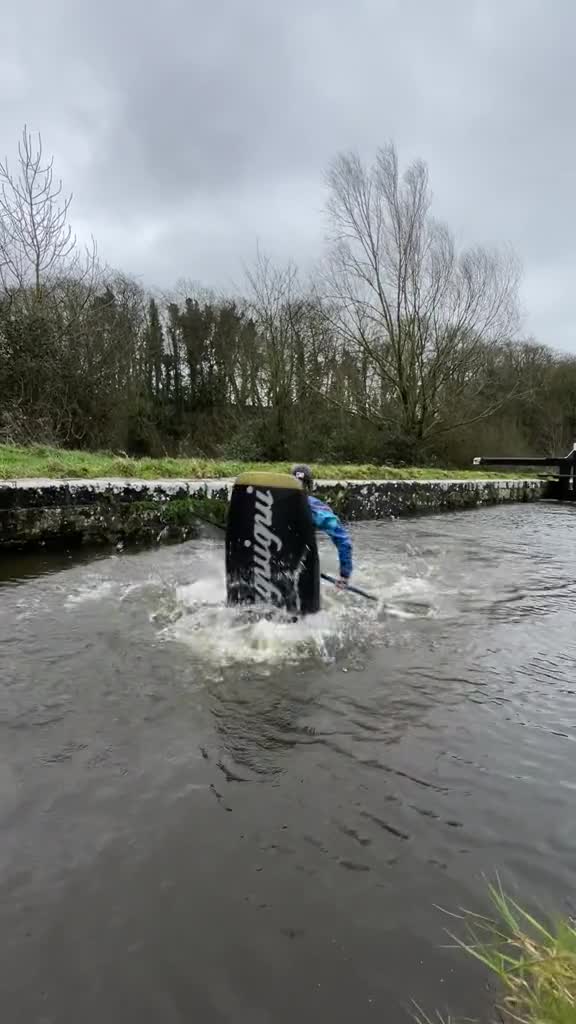 Watch me land a kayak loop on a quiet canal