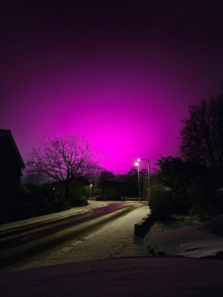 Mysterious pink skies amid England snowfall linked to soccer stadiums