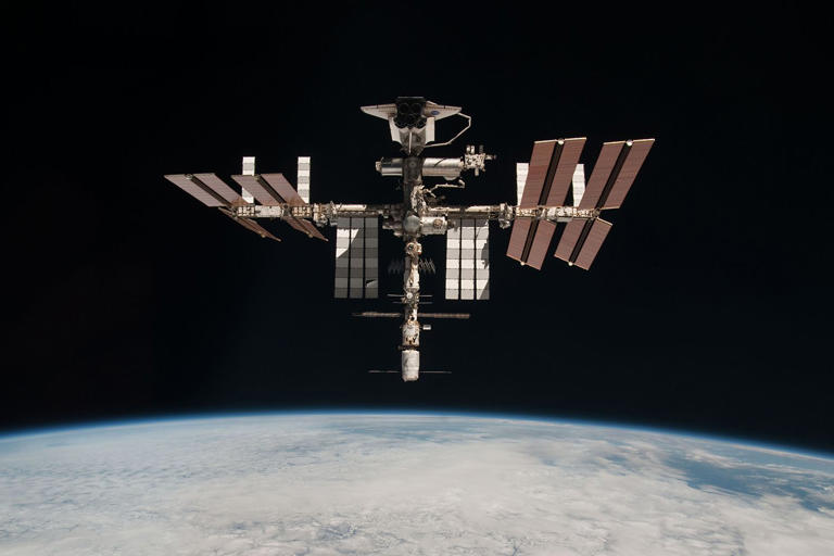 American astronauts return to International Space Station following ...