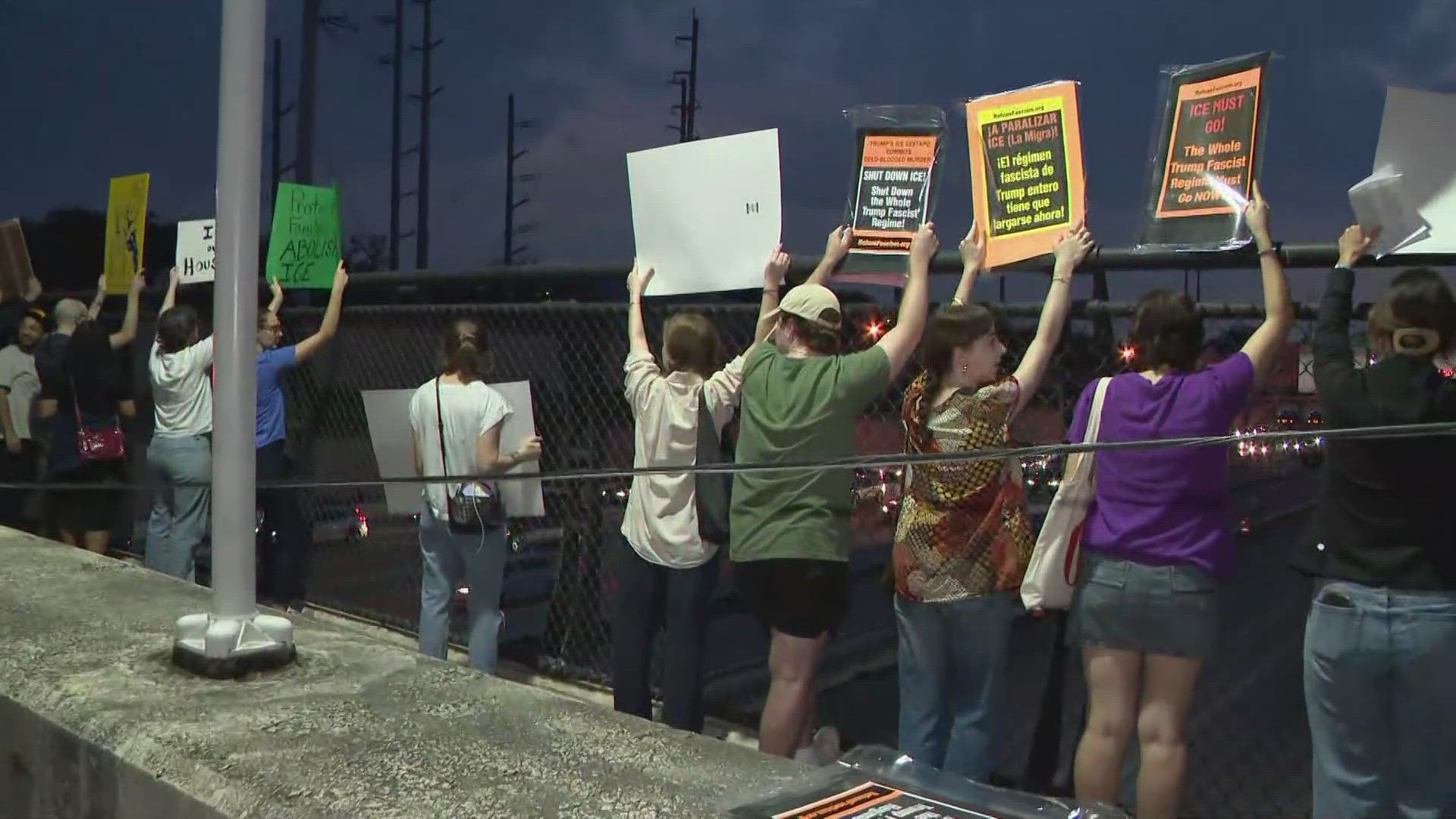 Houston ICE protest held on Dunlavy bridge over Southwest Freeway