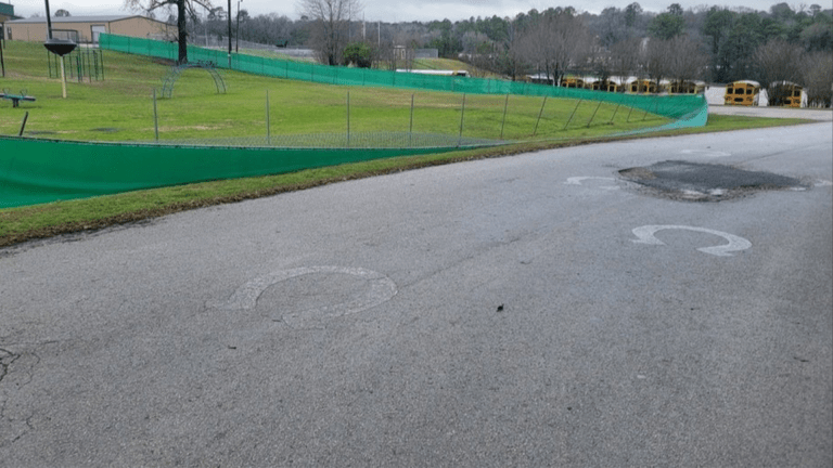 Overton begins appeal over TXDOT order to remove horseshoe road markings