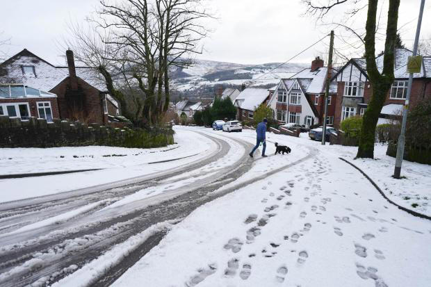 Snow and ice warnings across UK today as thousands still without power ...