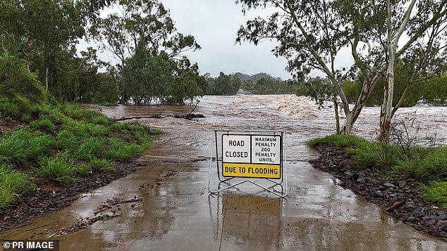 Cyclone threat looms off the Queensland coast as rain-weary residents ...