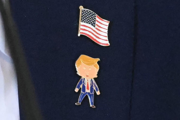 President Trump wears 'Happy Trump' lapel pin of himself for oil ...