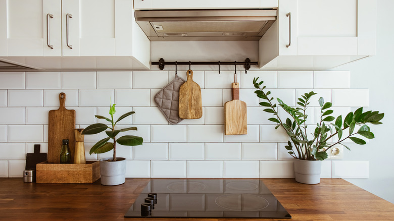 How to affordably DIY a custom kitchen backsplash with tile tattoos