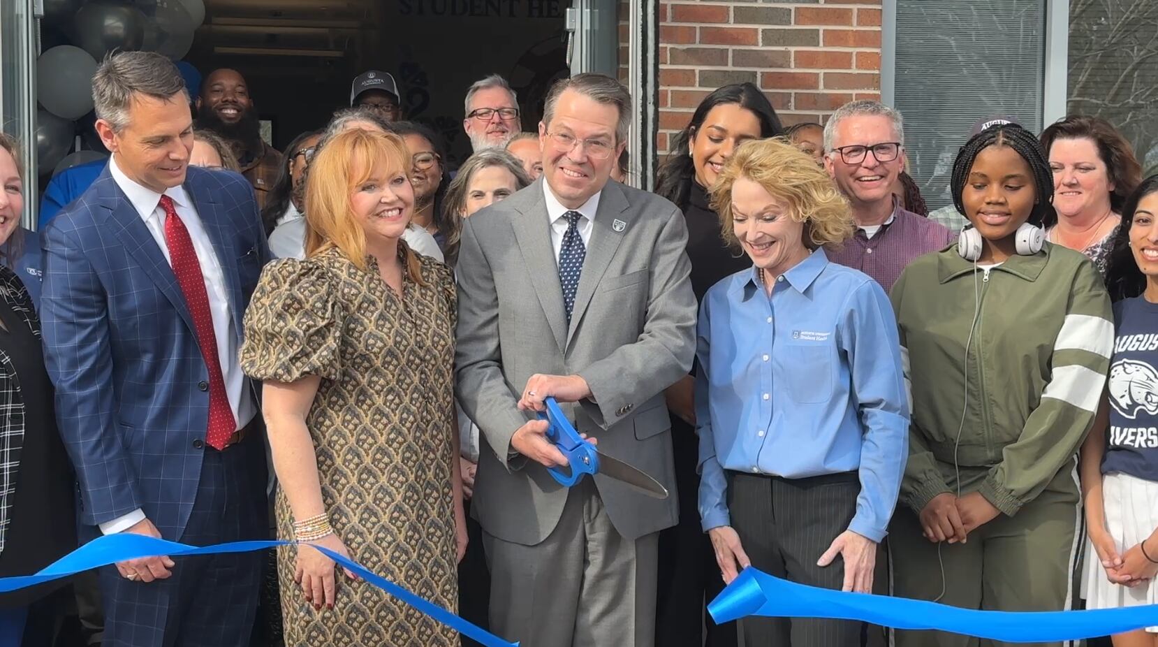 AU cuts ribbon on new student health services building