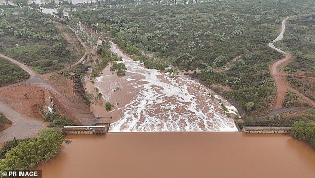 Cyclone threat looms off the Queensland coast as rain-weary residents ...
