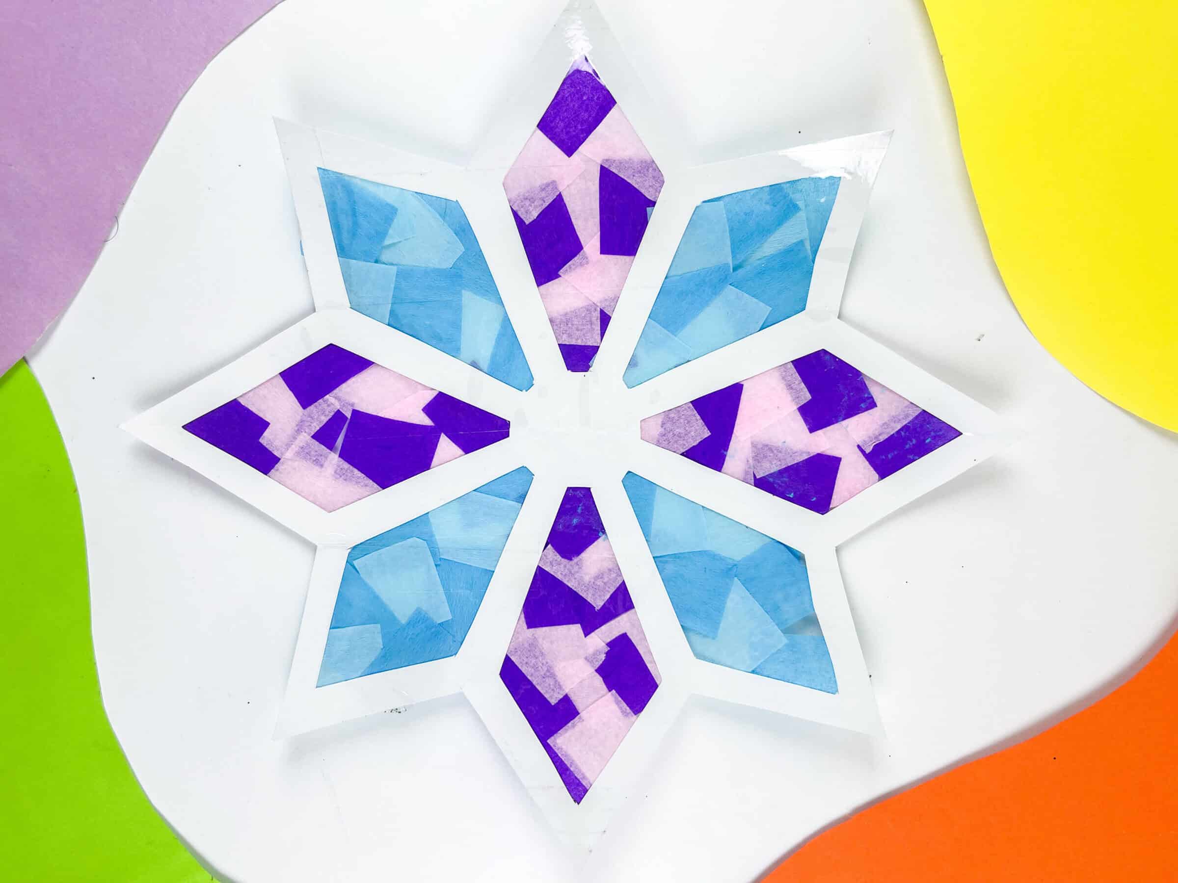 Easy and fun snowflake suncatcher craft for kids