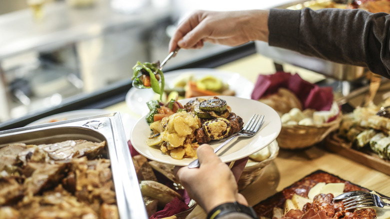 Why piling up your plate at a buffet is actually quite the mistake