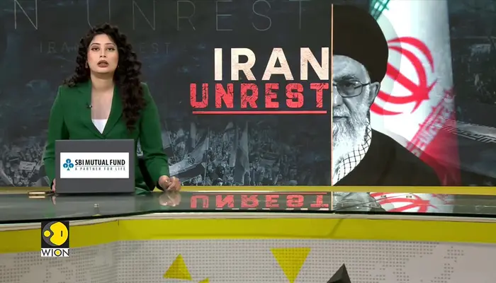 Cars and buildings set on fire in Tehran protest; death toll rises to 65