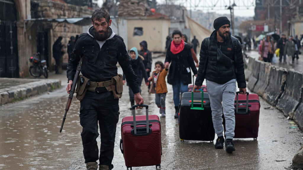 Syria urges Kurdish fighters to surrender after ramping up Aleppo operation