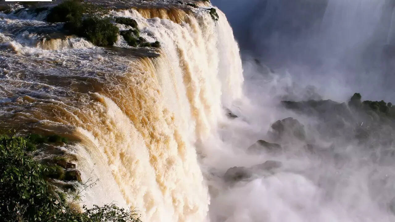 This waterfall is called 'The Smoke That Thunders' and the reason is wild