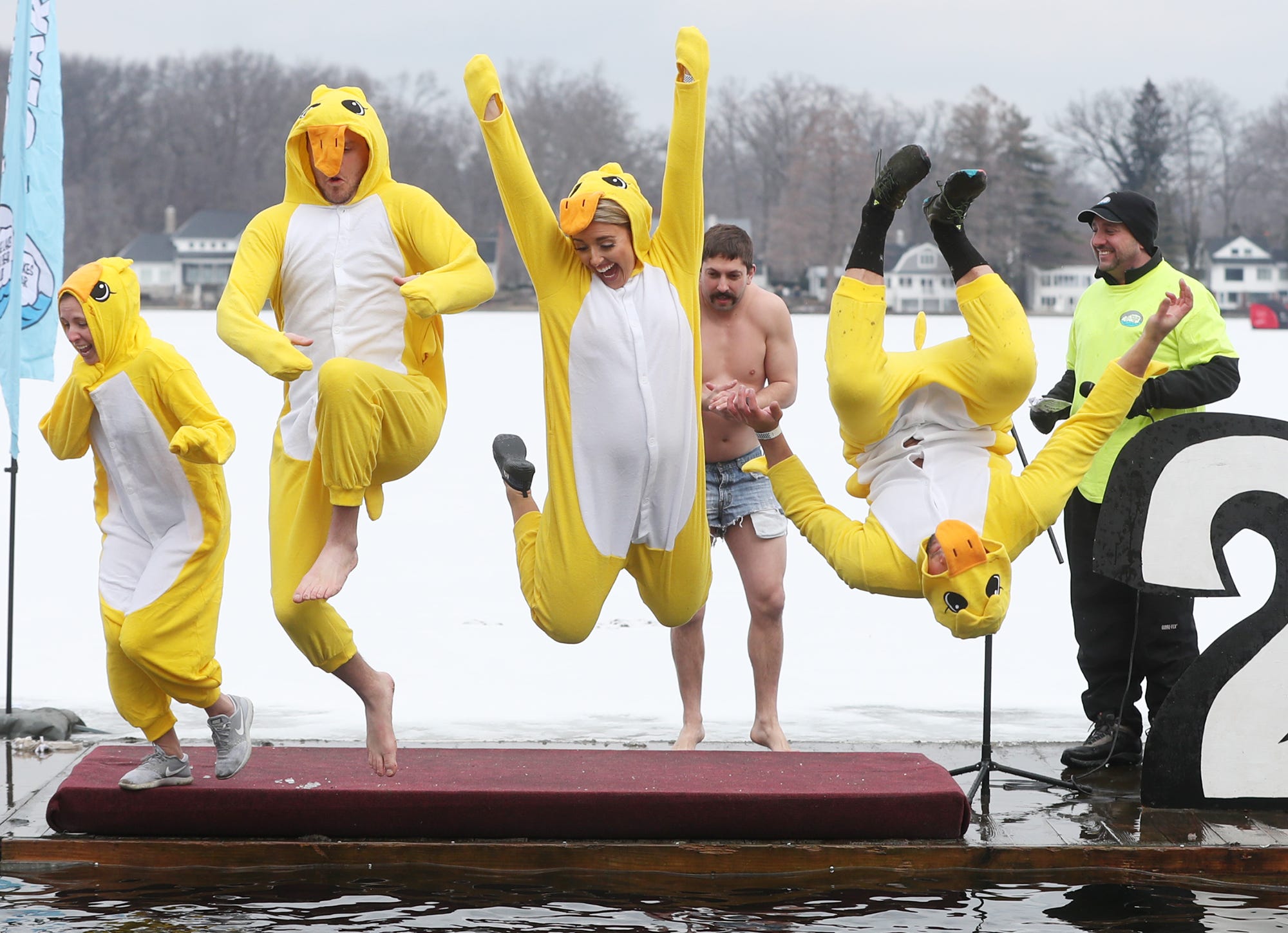 Portage Lakes Polar Bear Jump participants raise funds for food bank