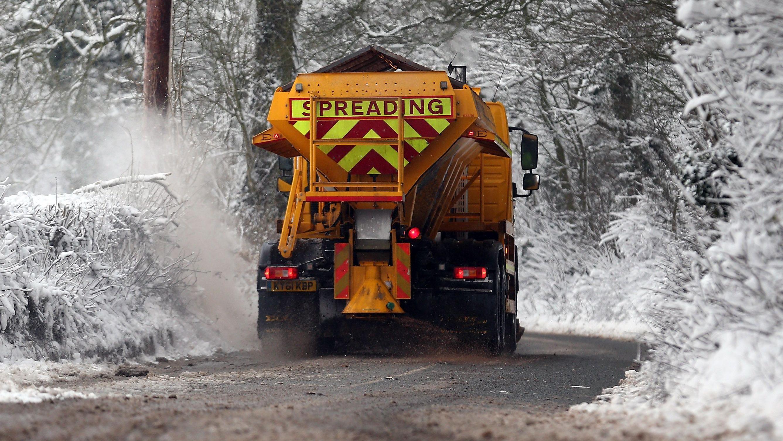 Gritter lorry overturns after slipping on black ice