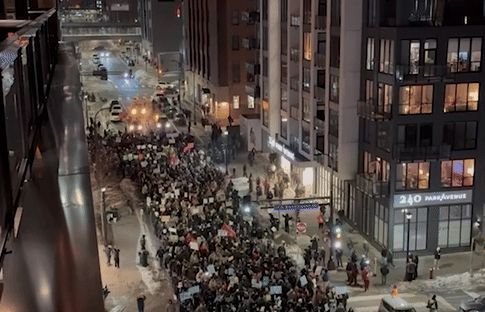 Overhead view shows protesters against ICE marching in Minneapolis ...