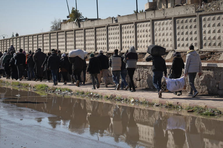 Syrian security forces enter Aleppo neighborhood after clashes with ...