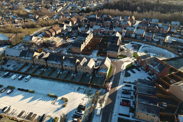 Spectacular aerial pictures show a major Wigan housing estate is ...