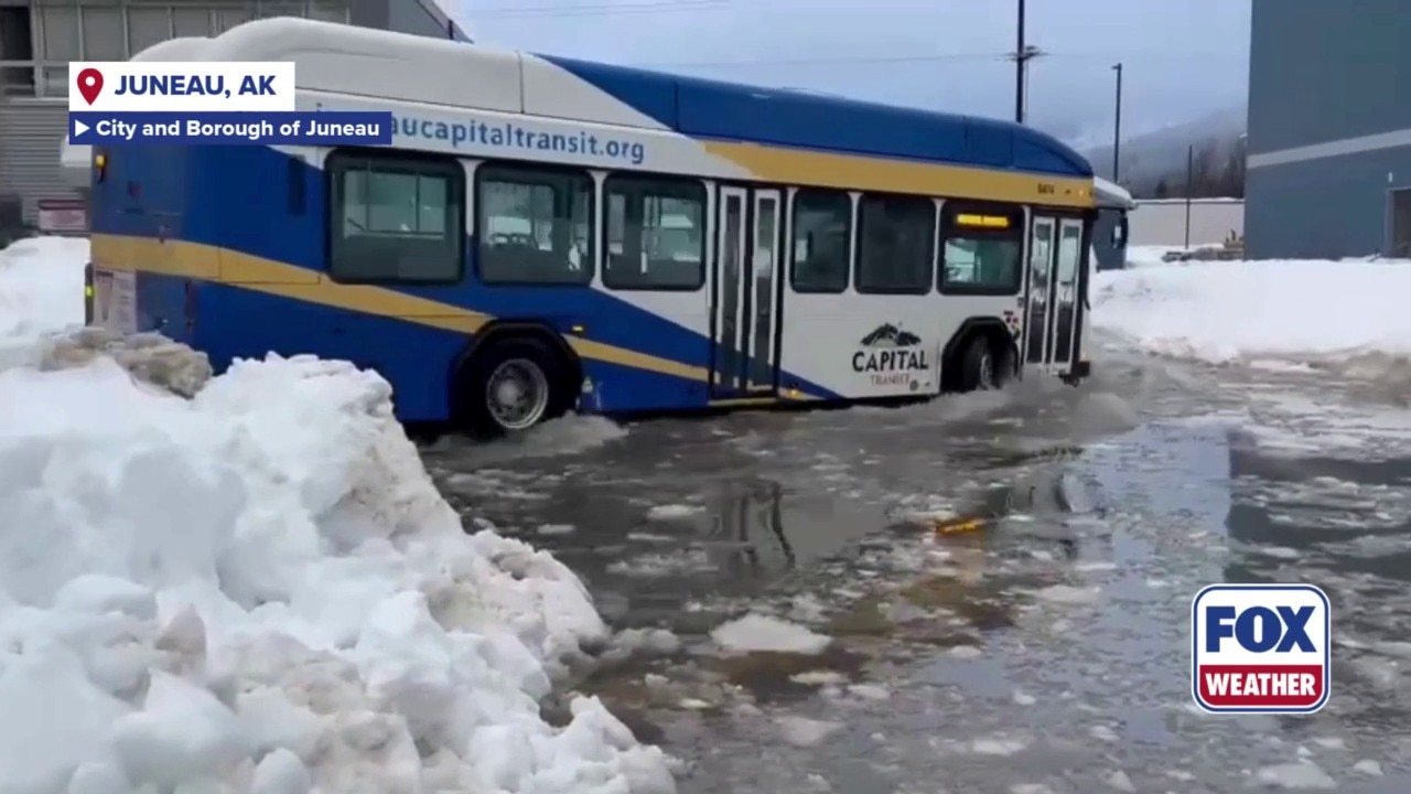 Watch: Bus drives through street flooding Juneau as snow melts