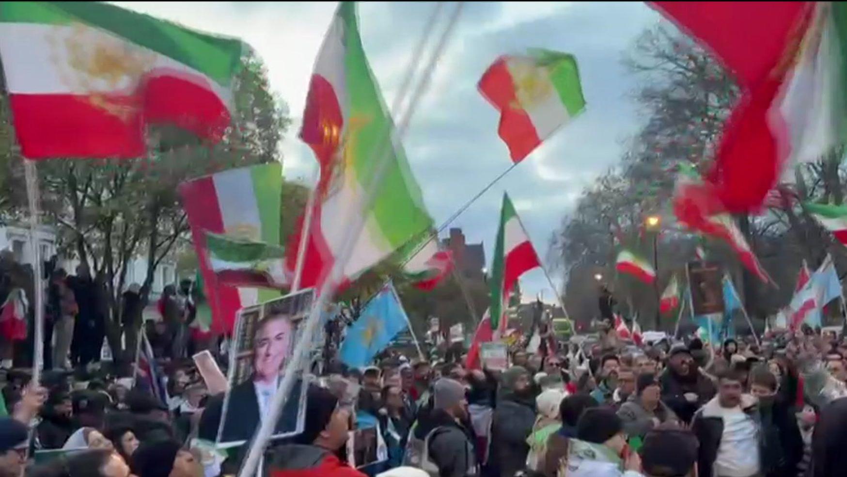 Protester climbs onto balcony of Iranian embassy in London