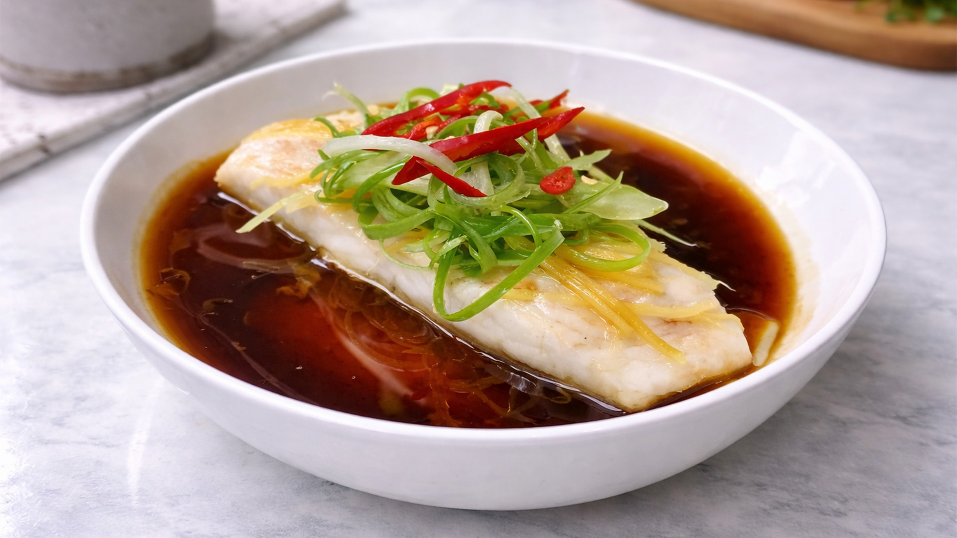 Simple steamed fish with soy sauce and ginger
