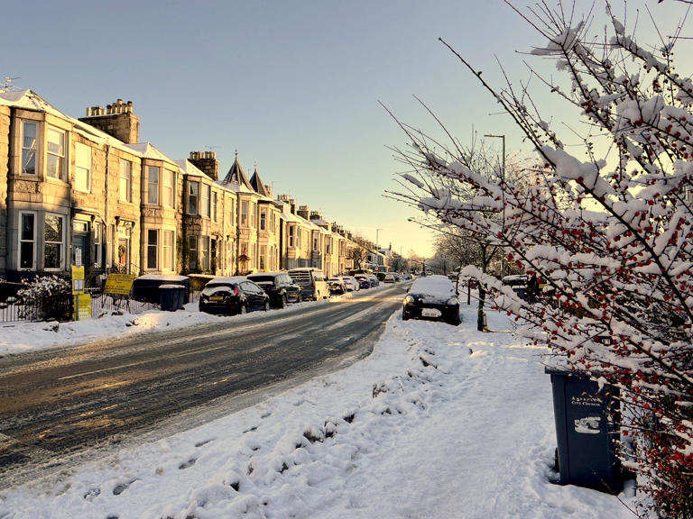 Scotland faces travel disruption as weather warnings stay in place