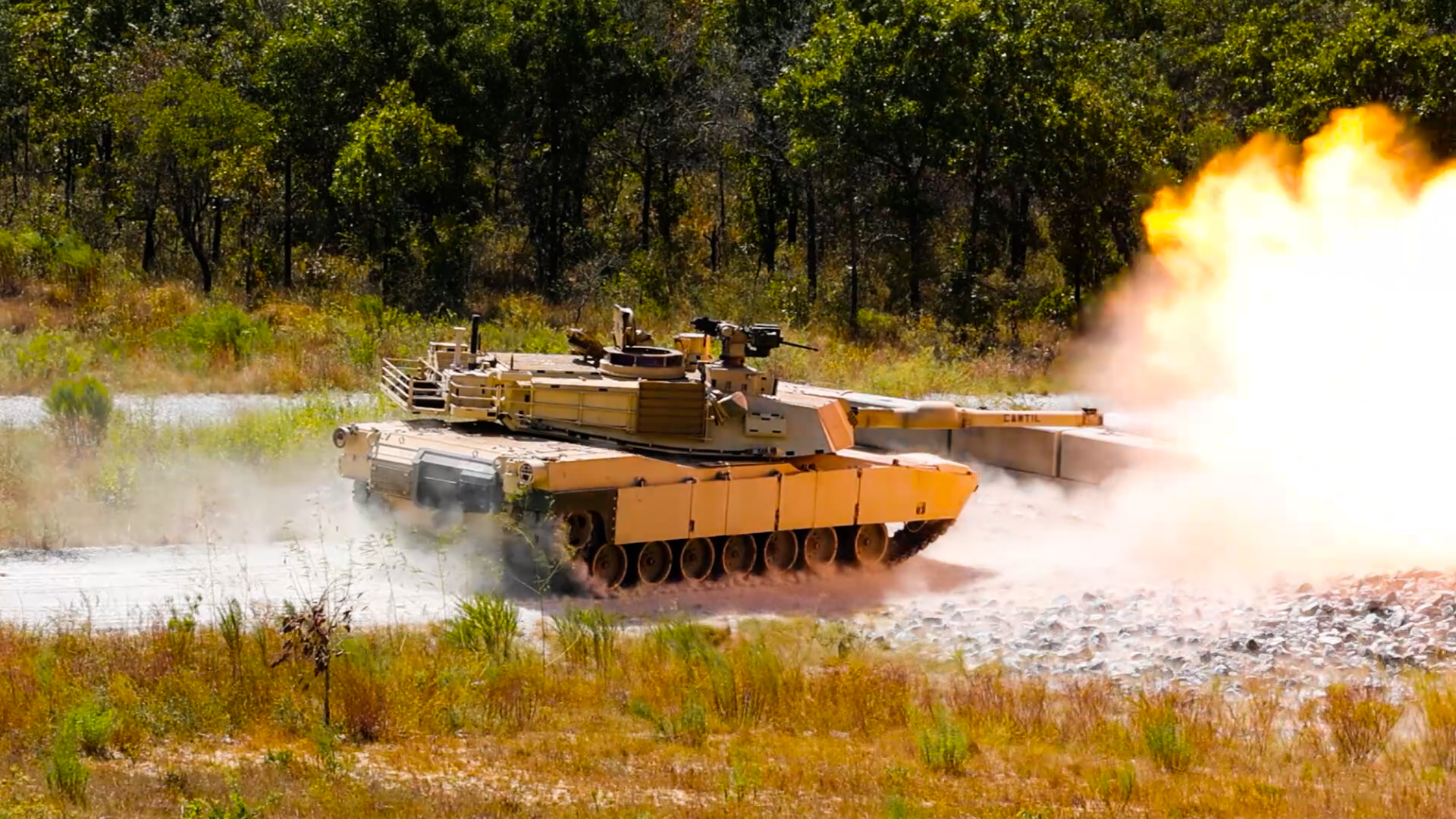 Army tank crews practice command skills with live fire
