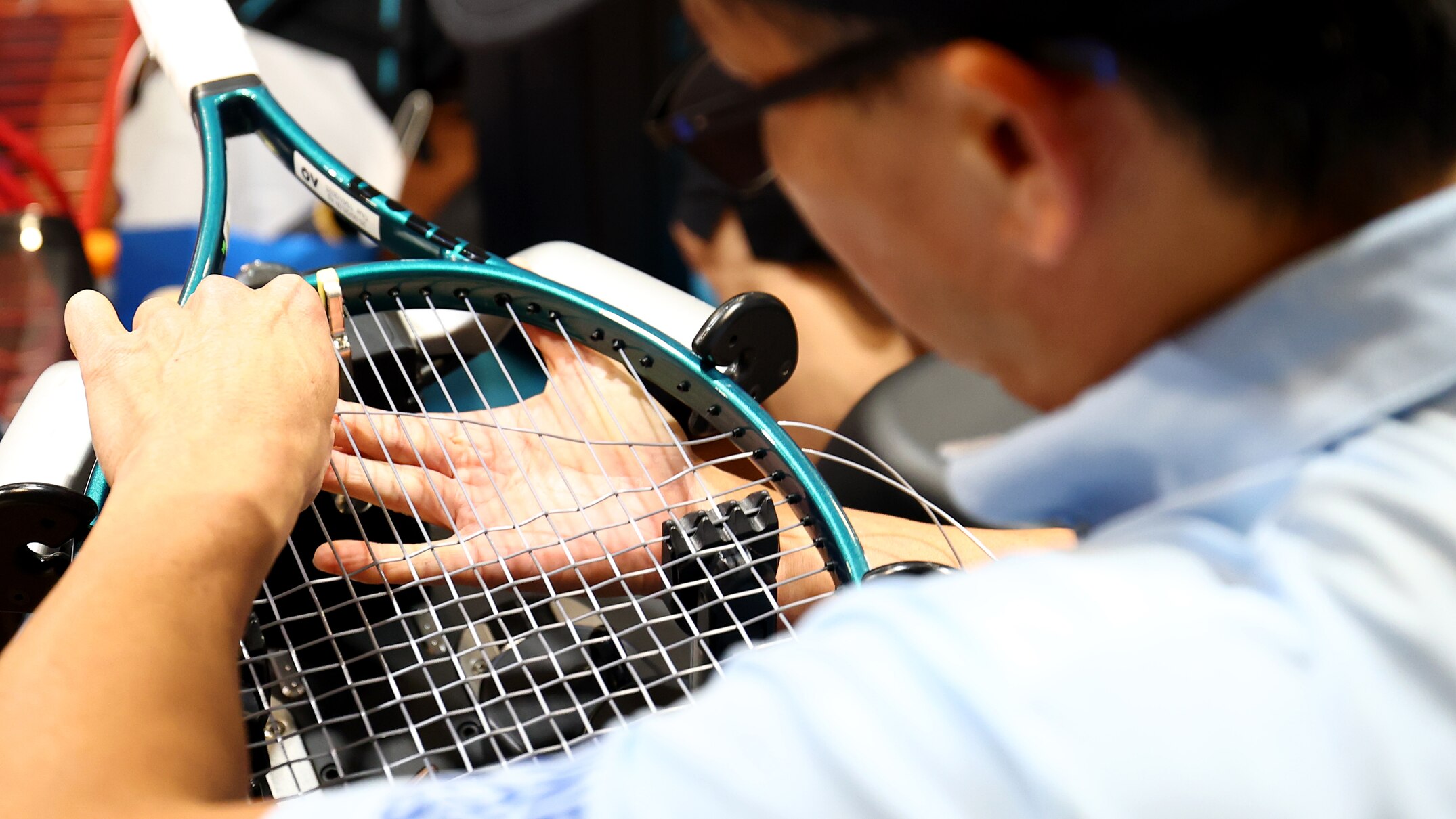 Tennis racquet stringer numbers take a hit in Australia while ...