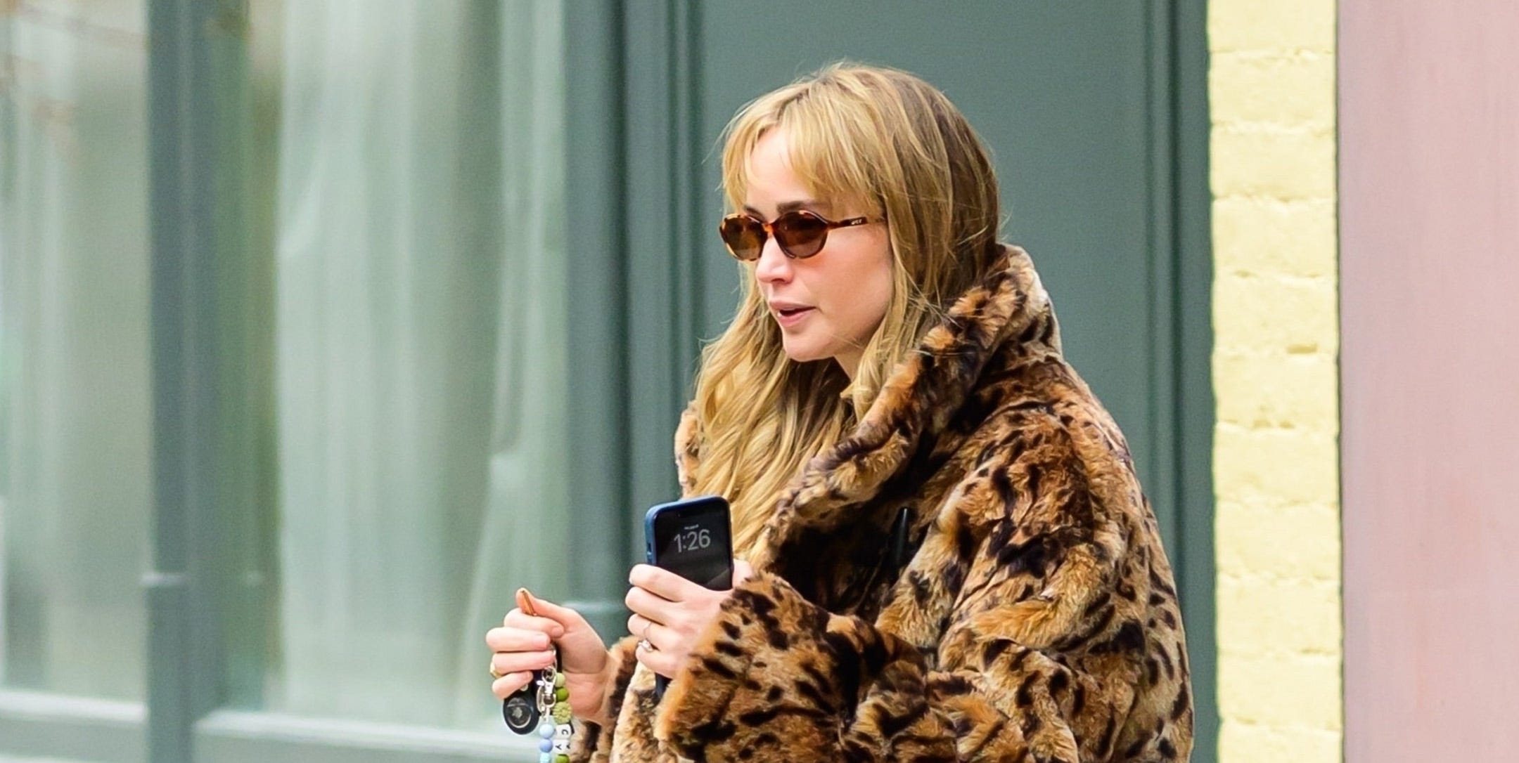 Jennifer Lawrence adds a pop of turquoise to her signature animal-print ...