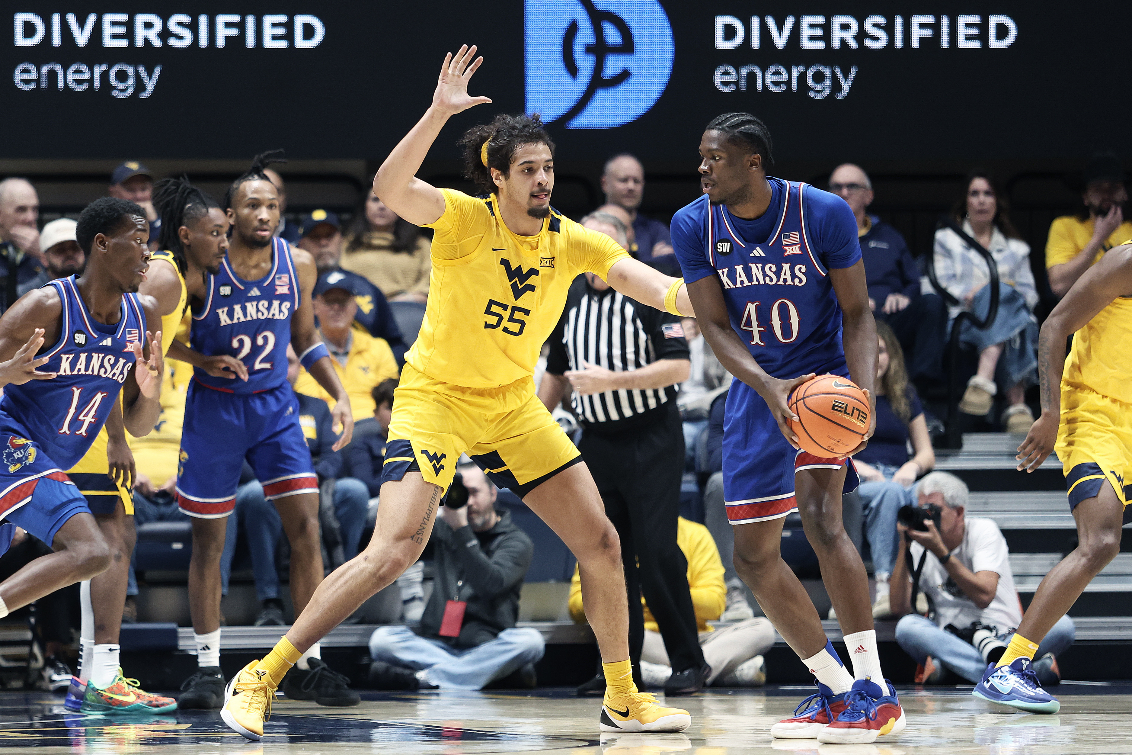 Honor Huff and Brenen Lorient help West Virginia beat No. 22 Kansas 86-75