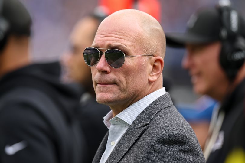 Baltimore Ravens GM 'fought back tears' delivering John Harbaugh news