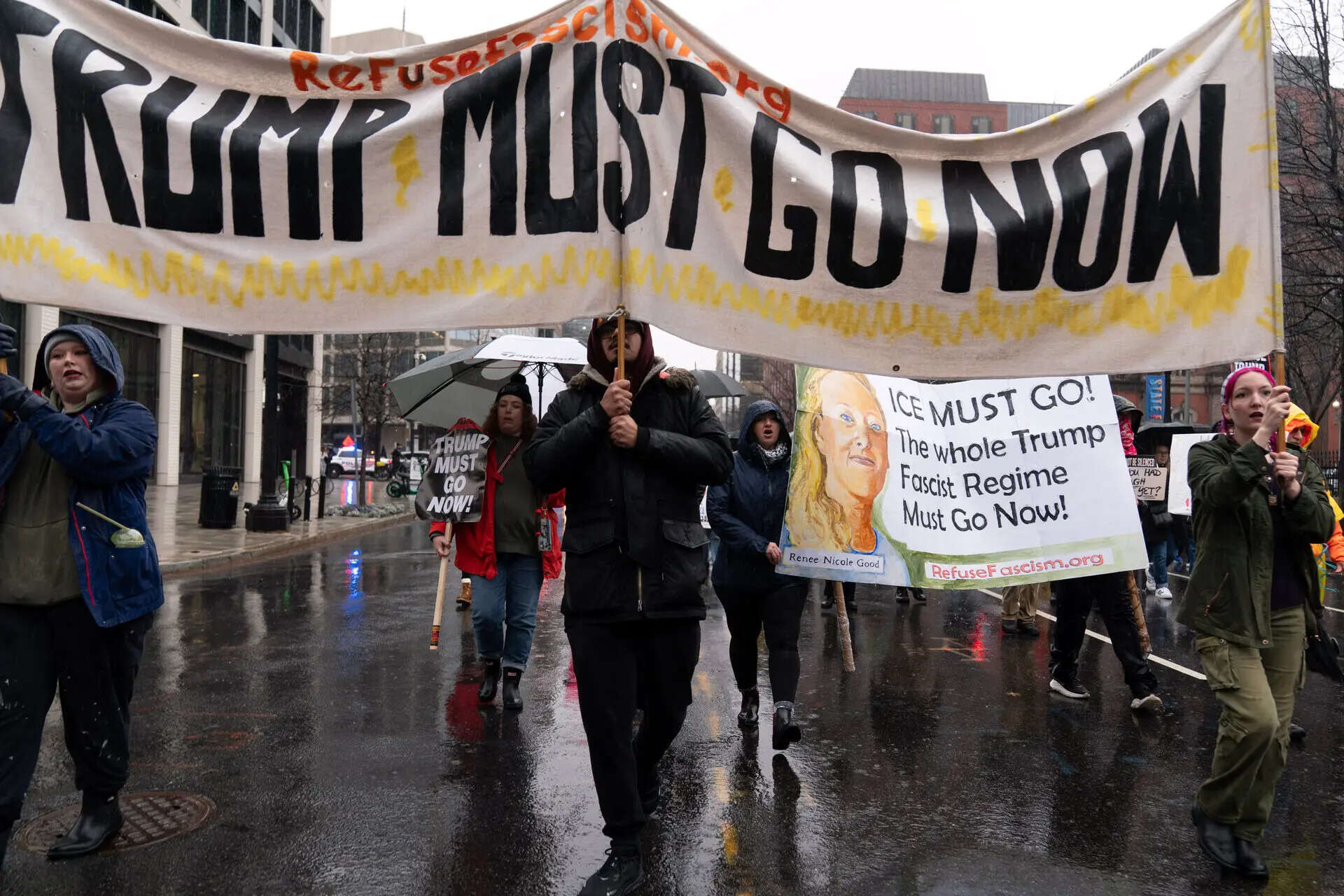 Anti-ICE protesters assemble across the US after shootings in ...