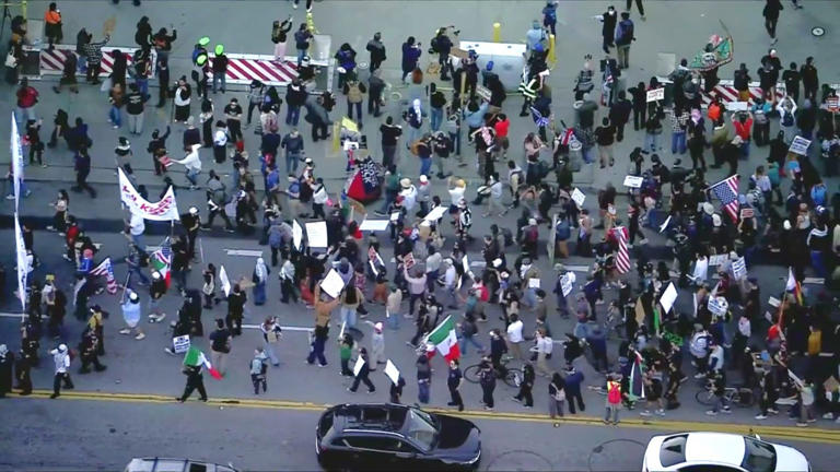 Live: Crowds protest federal immigration activity in downtown Los Angeles