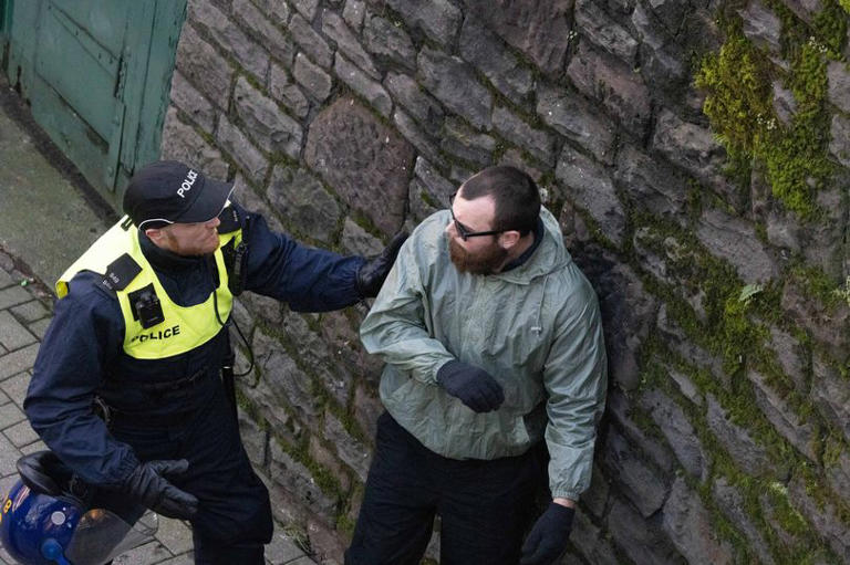 Protest and counter-demo take over major English city as police keep ...