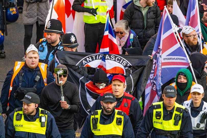 Protest and counter-demo take over major English city as police keep ...